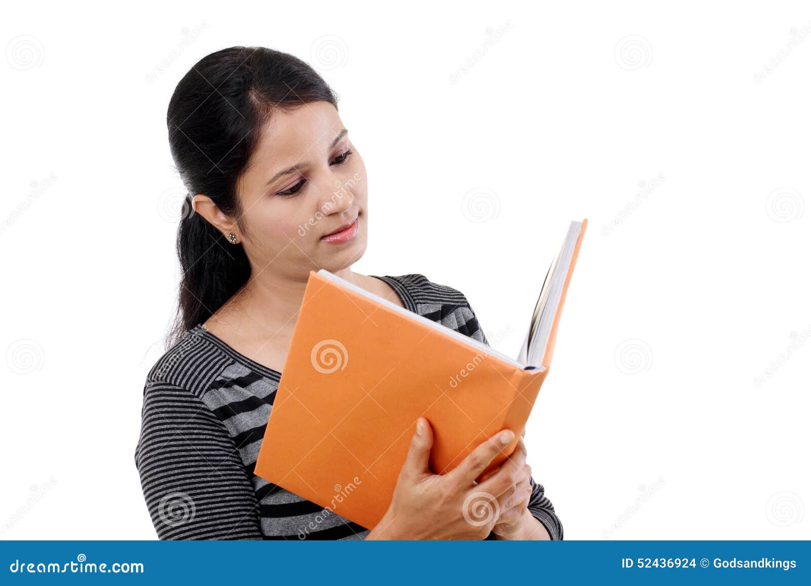 Young Female Student Reading a Text Book Stock Photo - Image of person ...