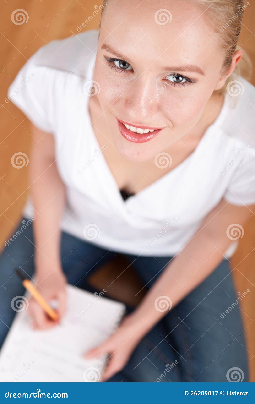 Young Female Student Taking Notes while Studying Stock Image - Image of ...