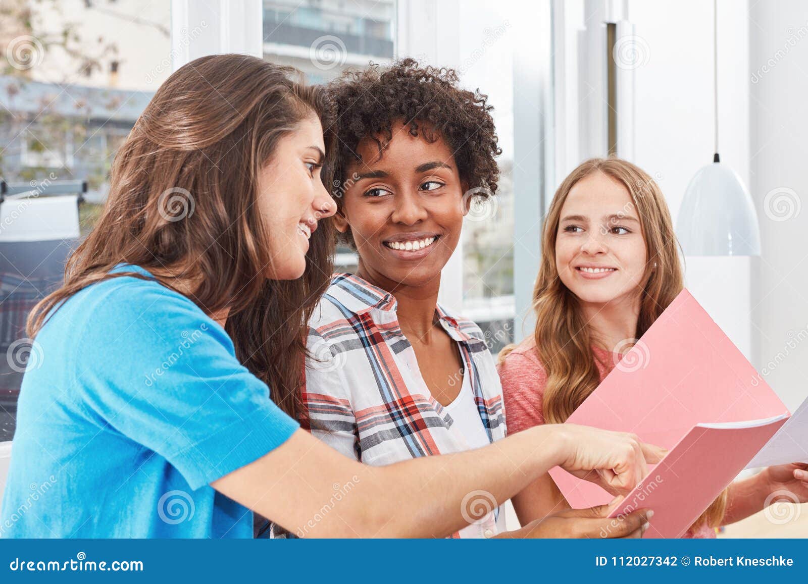 Three Female Students are Learning Together Stock Photo - Image of ...