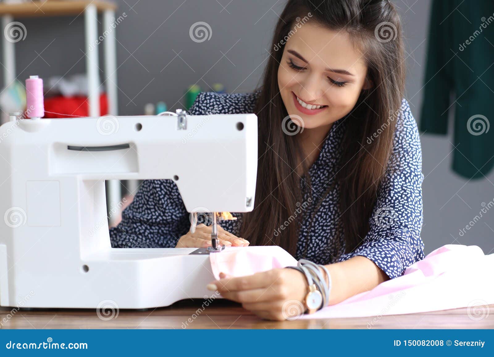 Young Female Tailor Using Sewing Machine in Atelier Stock Photo - Image ...