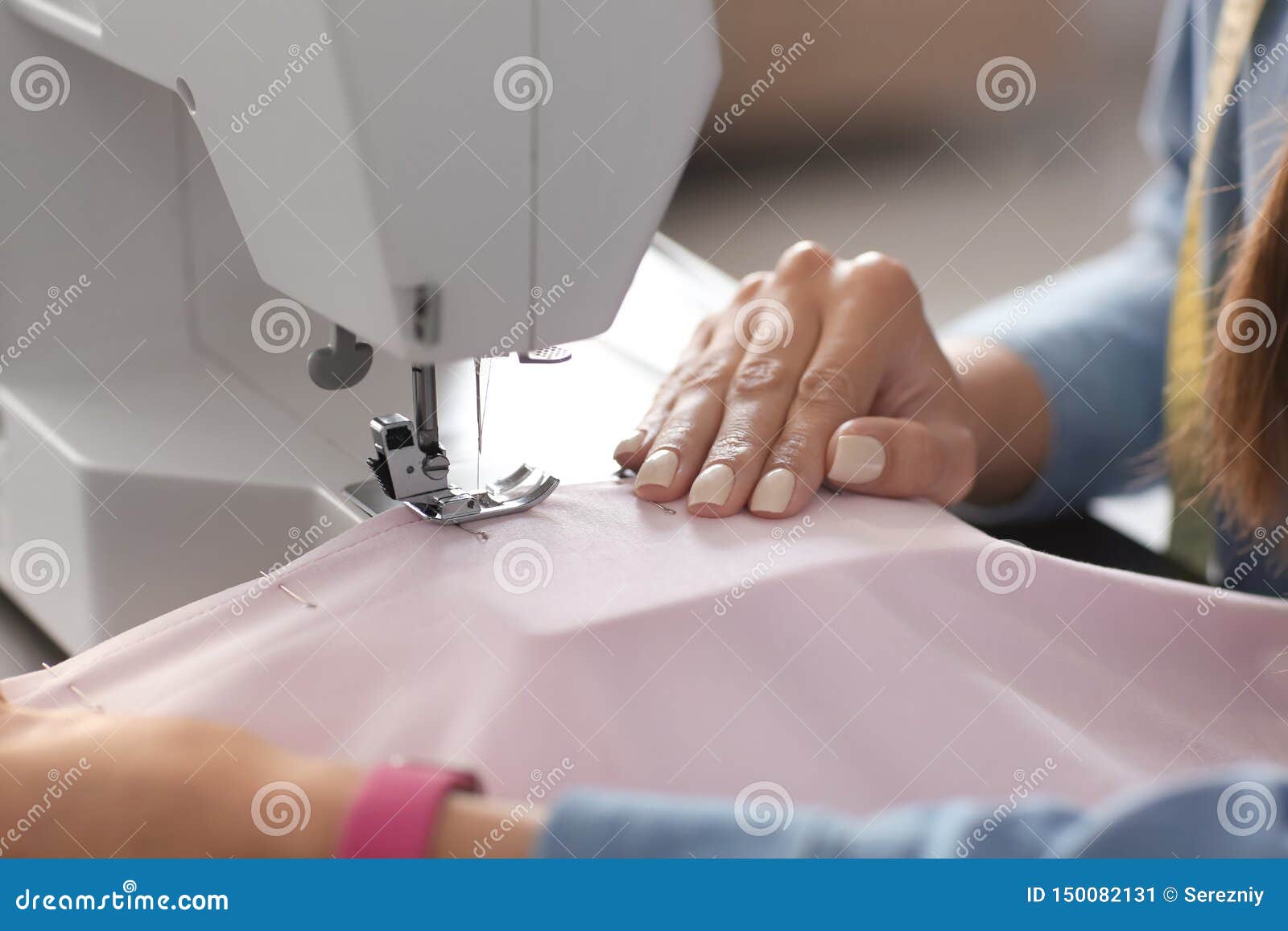 Young Female Tailor Using Sewing Machine, Closeup Stock Image - Image ...