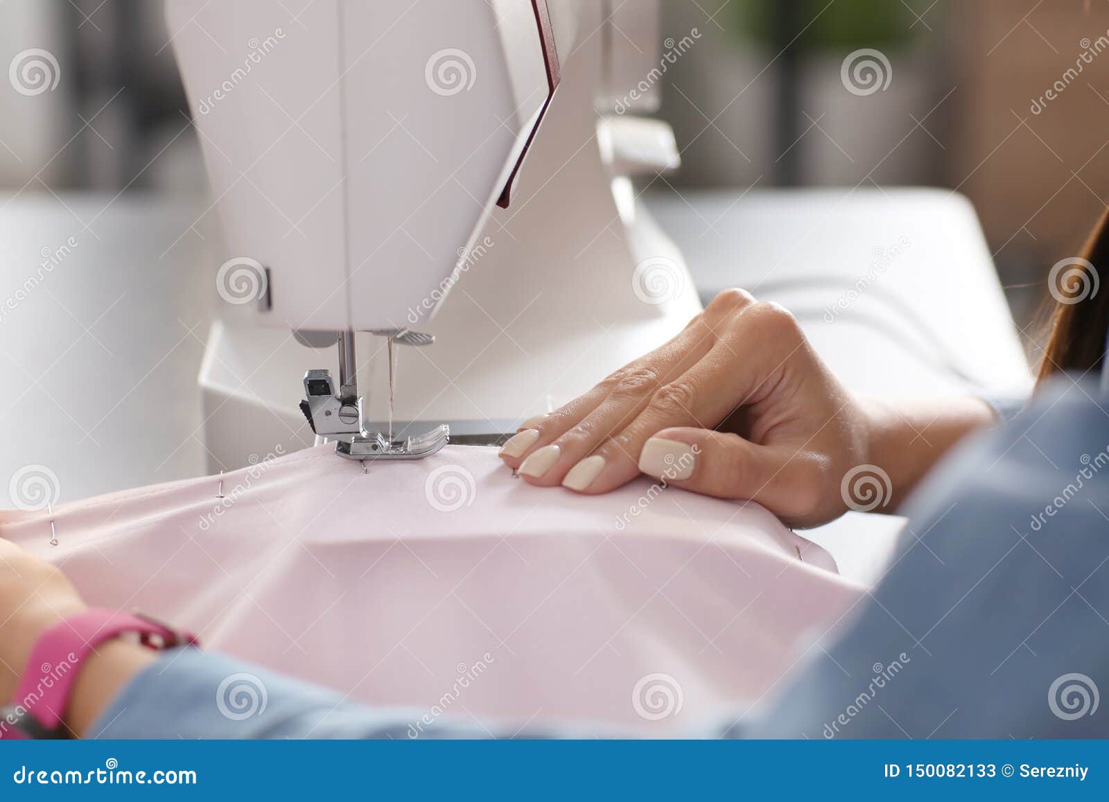 Young Female Tailor Using Sewing Machine, Closeup Stock Image - Image ...