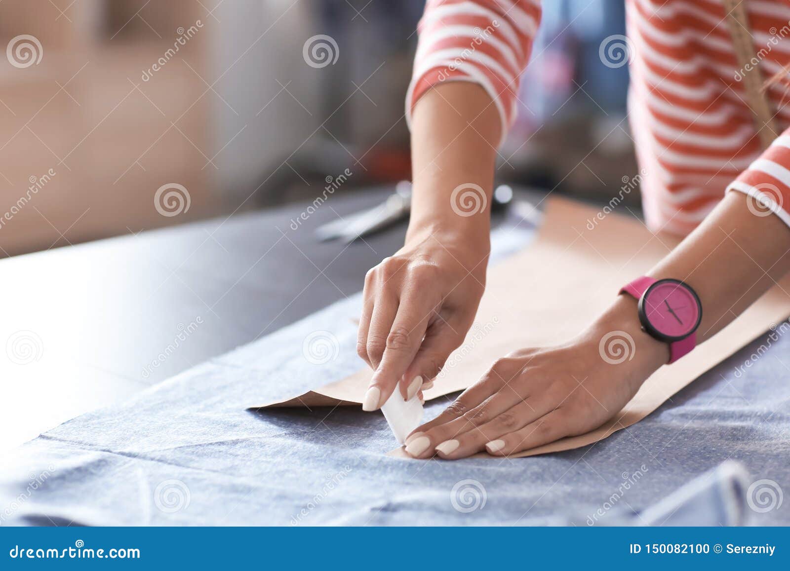 Young Female Tailor Working with Sewing Pattern in Atelier Stock Photo ...