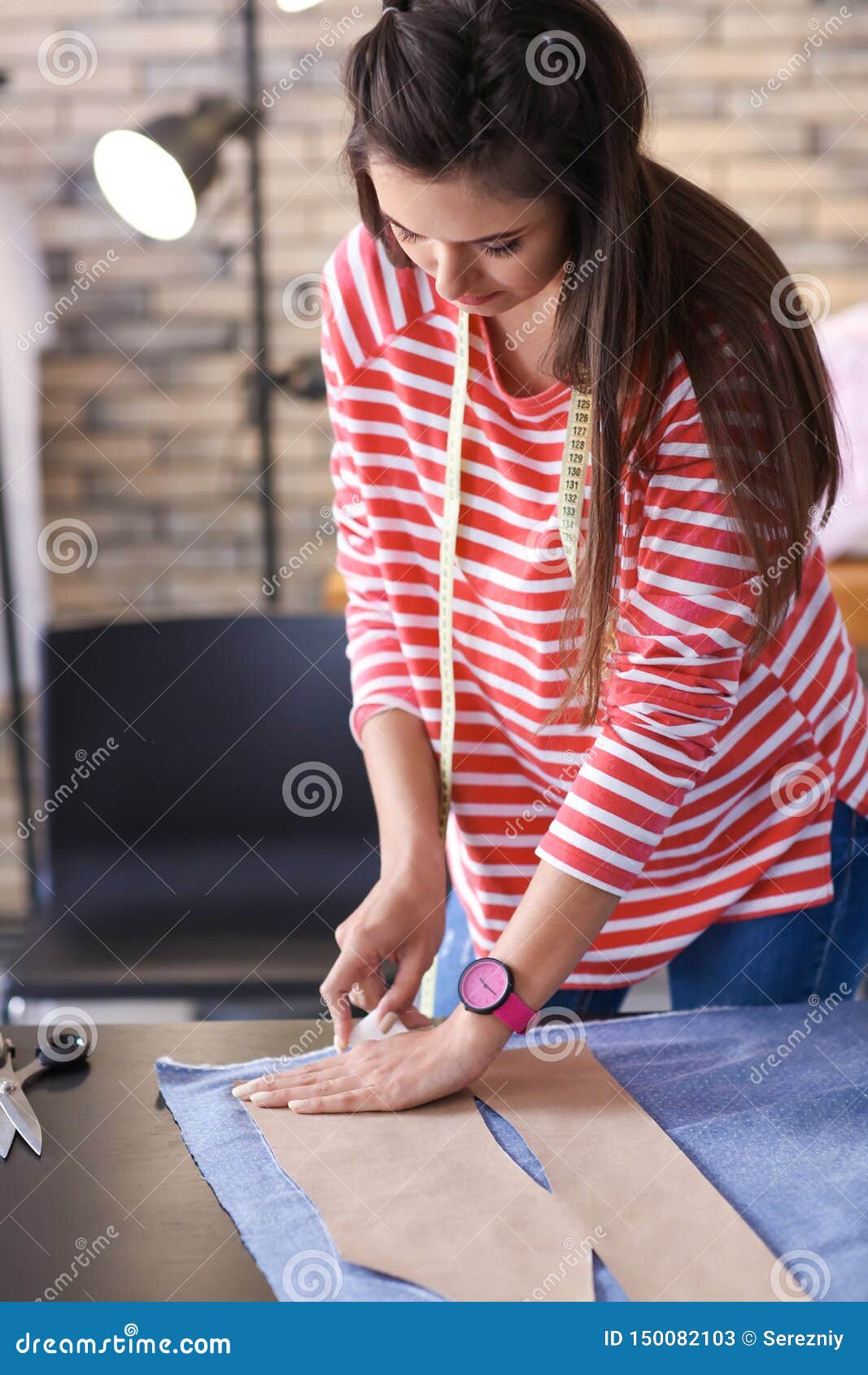 Young Female Tailor Working with Sewing Pattern in Atelier Stock Image ...