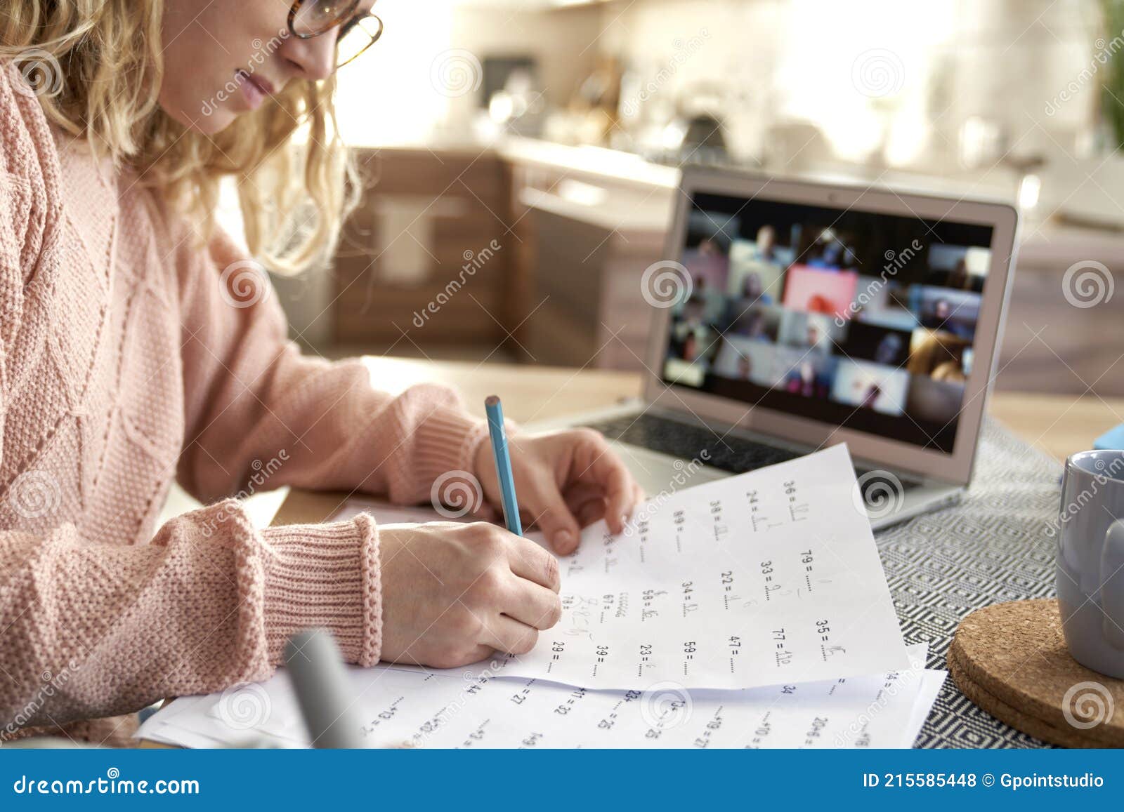 Young Female Teacher Marks Exam Papers during Online Classes Stock ...