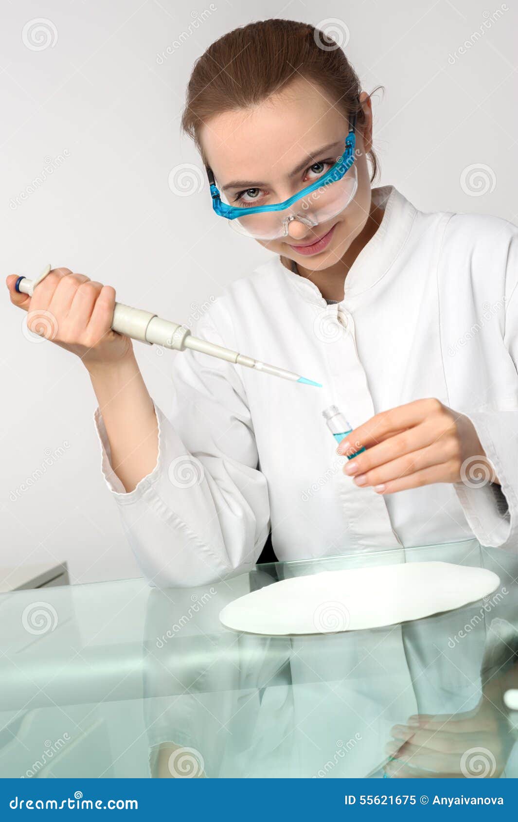 Young Female Tech or Scientist Works with Automatic Pipette Stock Image ...
