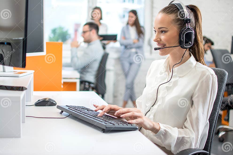 Young Female Technical Support Dispatcher Working in Office. Stock ...