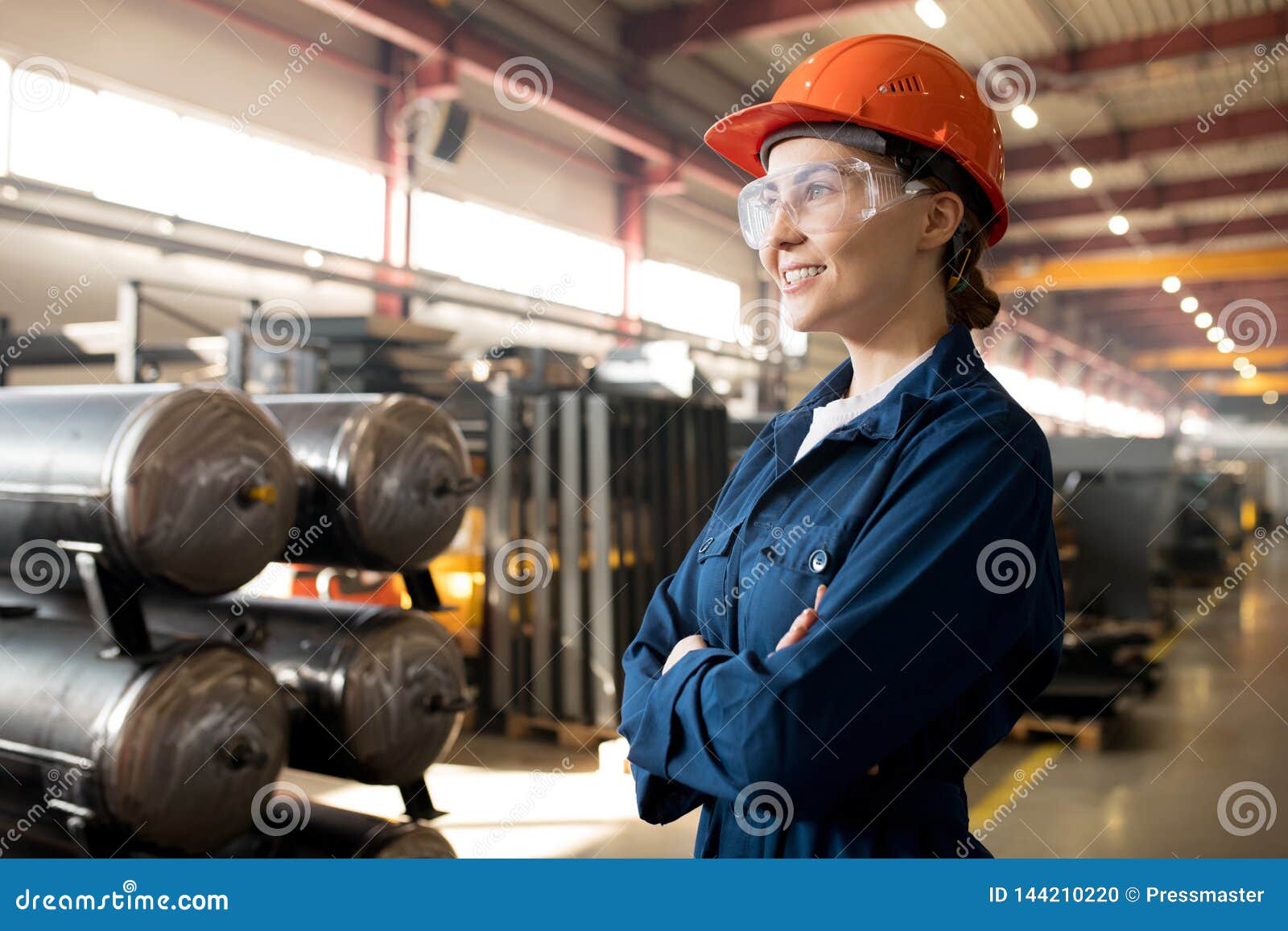 Young female technician stock photo. Image of machinery - 144210220
