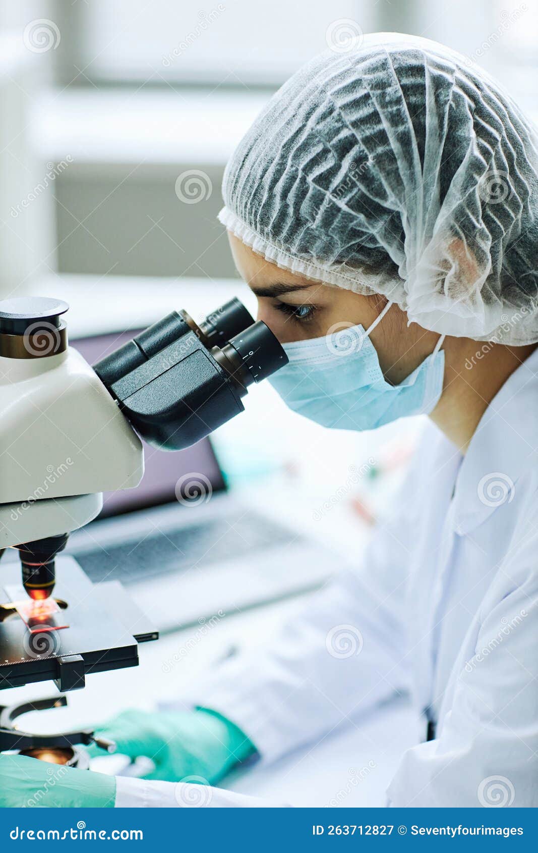 Young Female Technician Looking in Microscope Doing Research Stock ...