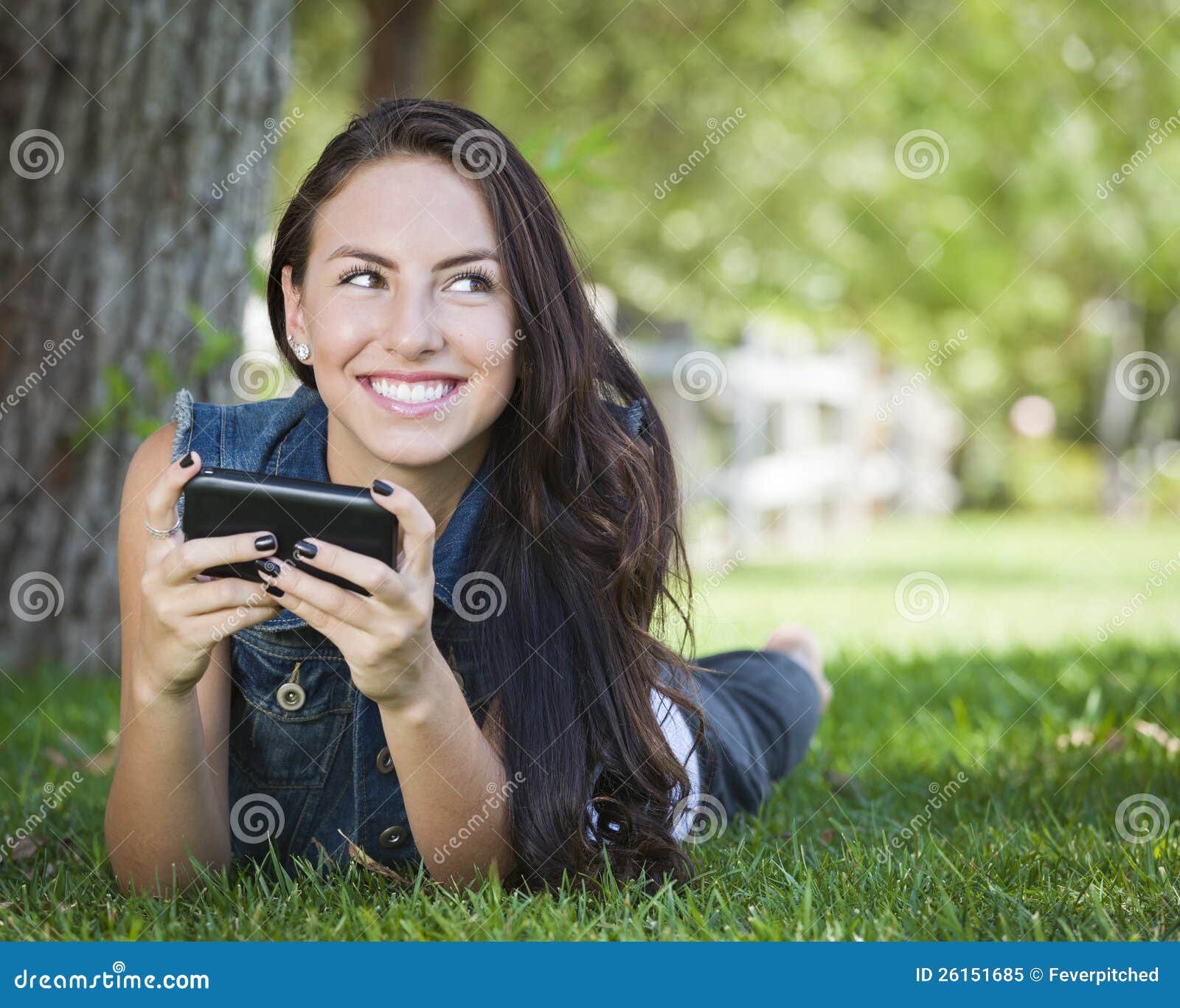 Young Female Texting on Cell Phone Outside Stock Image - Image of ...