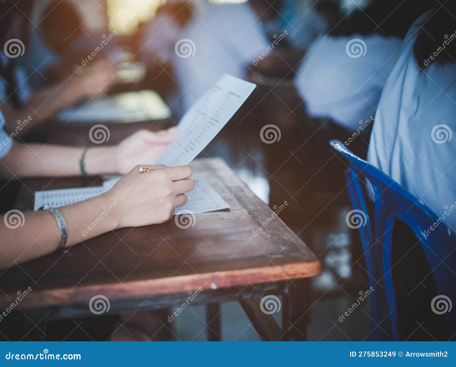 Young Female Uniform Student Taking Exam at School with Stress Stock ...