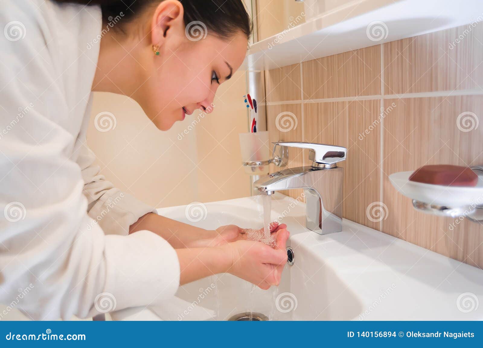 Young Female Washing Her Face in Bathroom Stock Photo - Image of skin ...