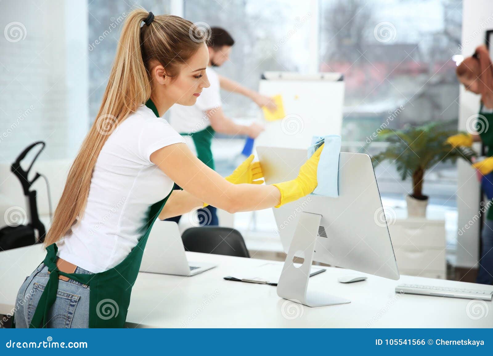 Young Female Worker Cleaning Office Stock Photo - Image of background ...
