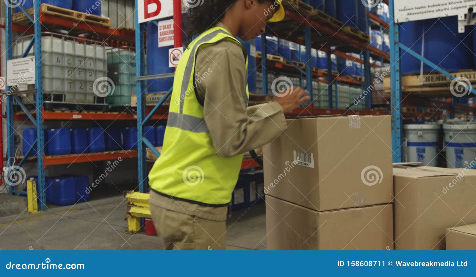 Young Female Worker Using Barcode Scanner in a Warehouse Stock Video ...