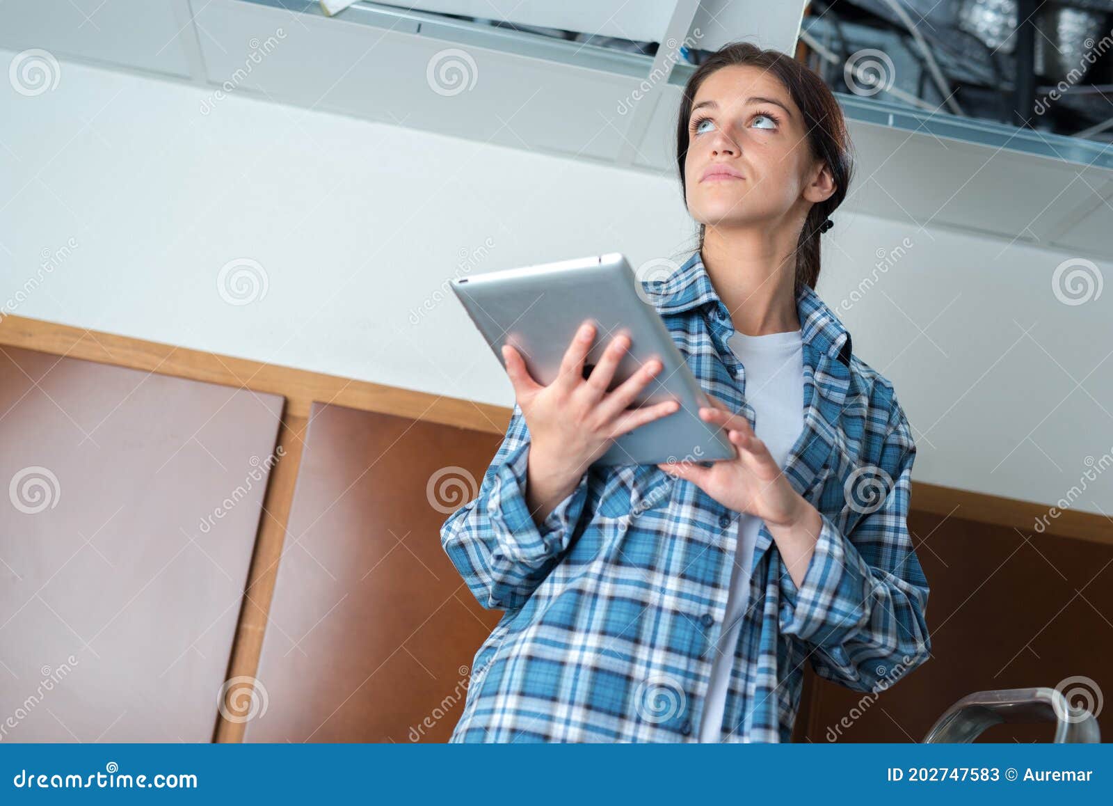 Young Female Worker Using Touchpad Stock Image - Image of standing ...