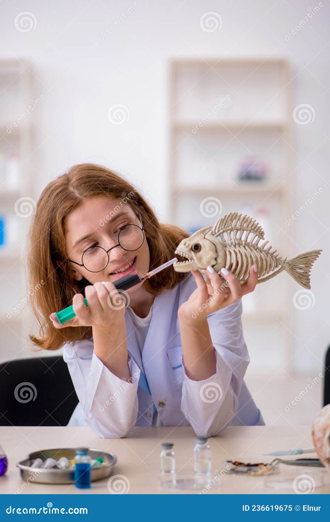 Young Female Zoologist Working at the Lab Stock Image - Image of paleontologist, fish: 236619675