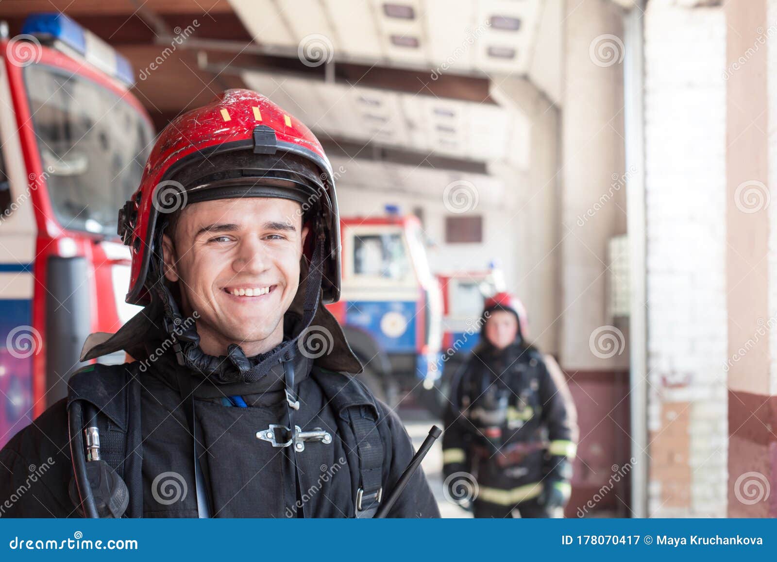 Firefighters On The Background Of Fire Engines Stock Image - Image of ...