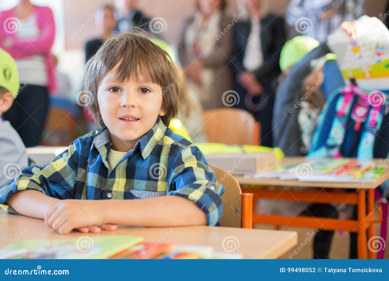 Young First Grade Student Sitting at Desk on His First Day at Sc Stock ...