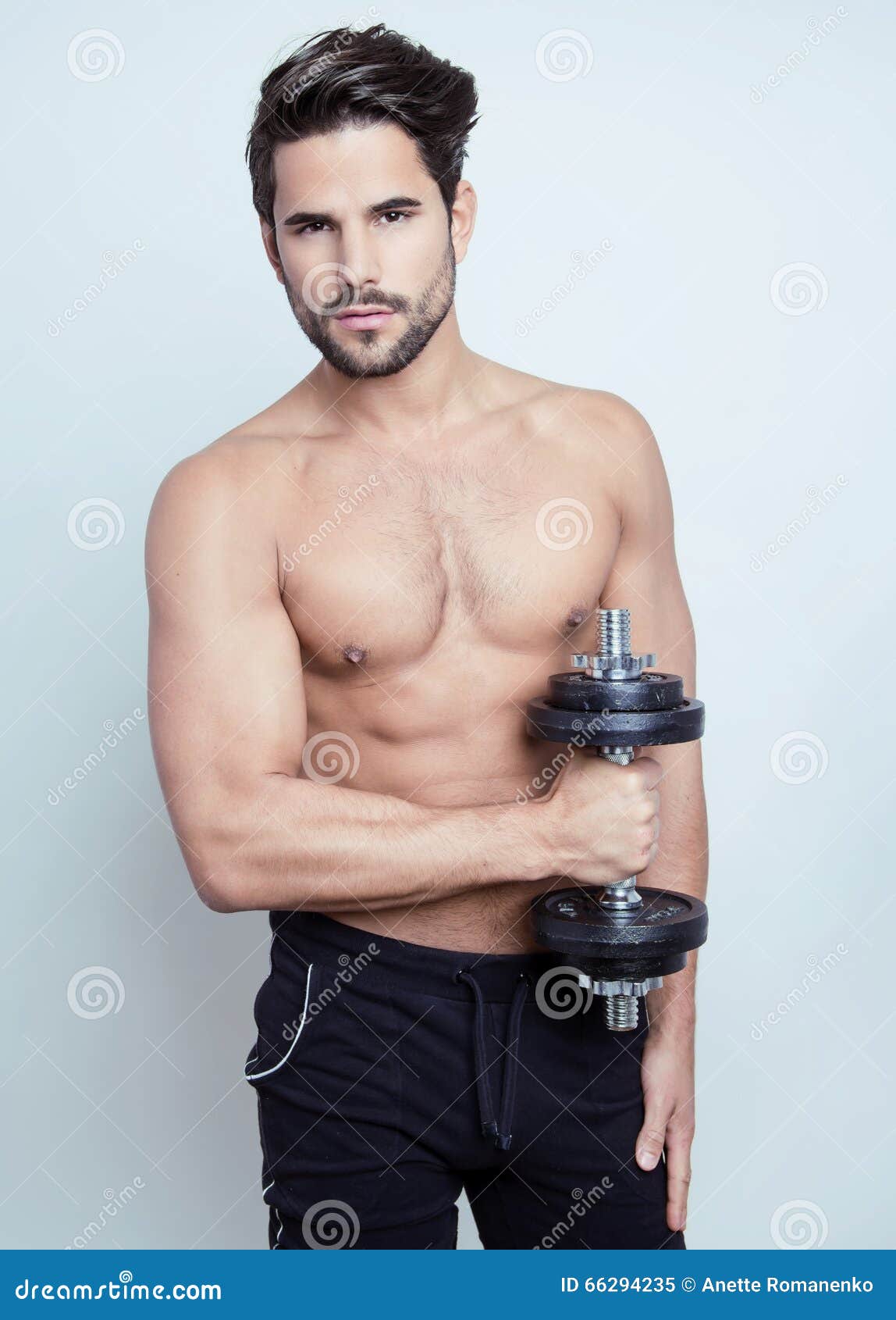 Young fit man stock image. Image of lifestyle, listening - 66294235