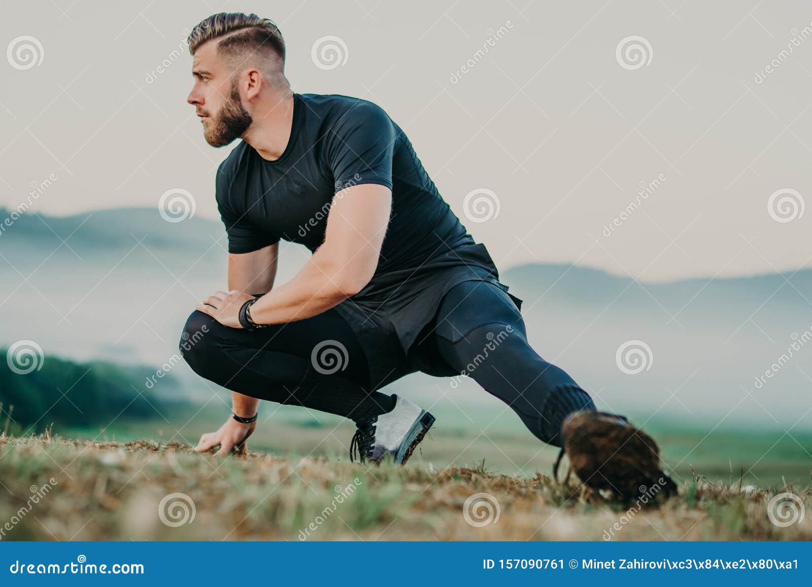 Young Fit Man Stretching Legs Outdoors Stock Image Image Of Males
