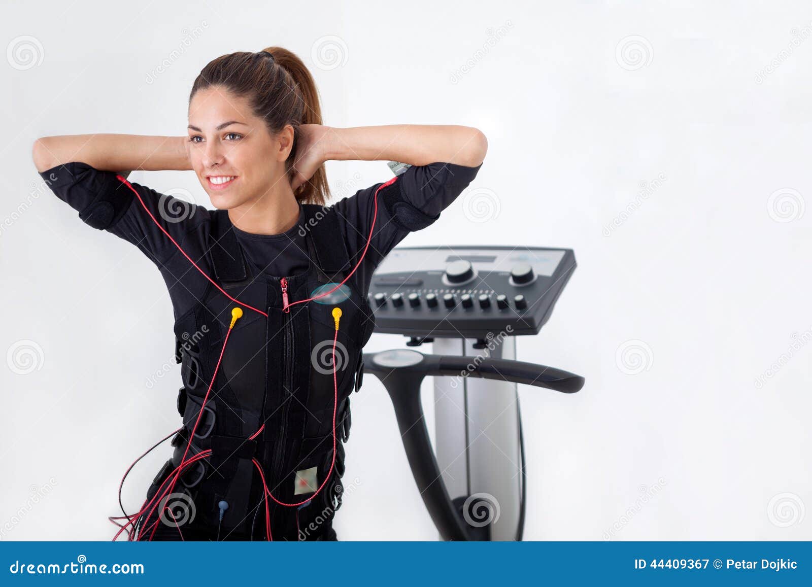 Young Fit Woman Exercise on Electro Muscular Stimulation Machine Stock ...