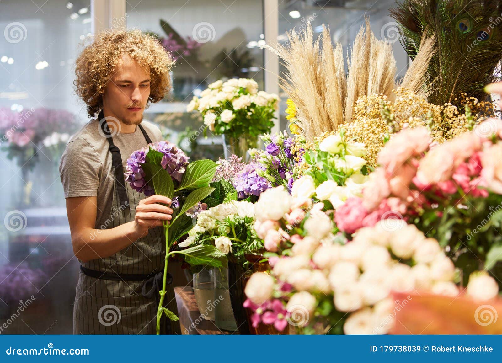 Young Florist in the Selection of Flowers Stock Image - Image of ...
