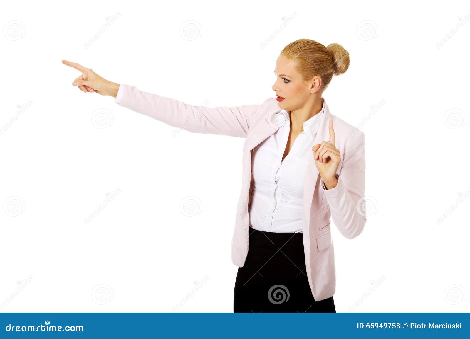 Young Focus Business Woman Explaining Something and Pointing at Board ...