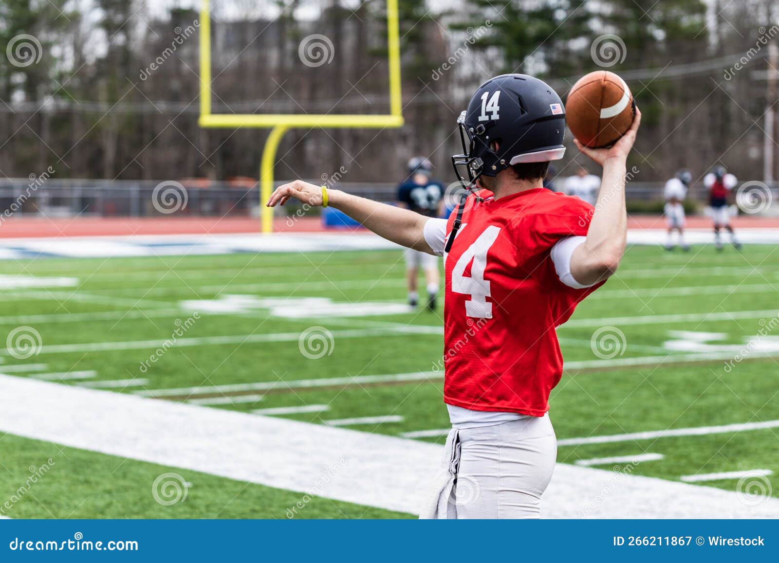 Young Football Player Throwing a Ball Stock Image - Image of outdoor ...