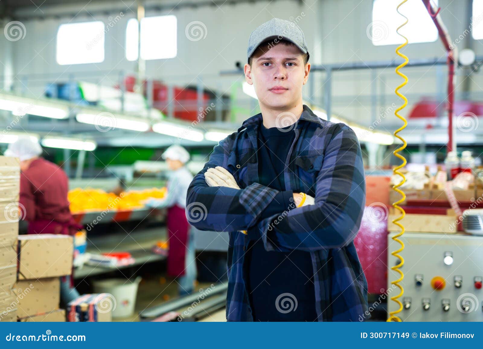 Young Foreman of Fruit Factory Standing on Citrus Sorting Line Stock ...