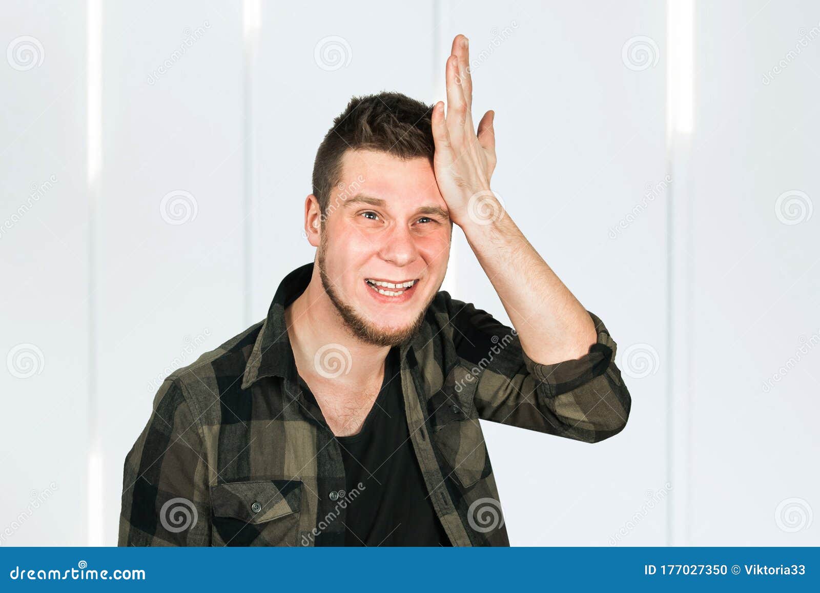 Young Forgetful Bearded Guy with Bad Memory and Migraine Holds Hand at ...