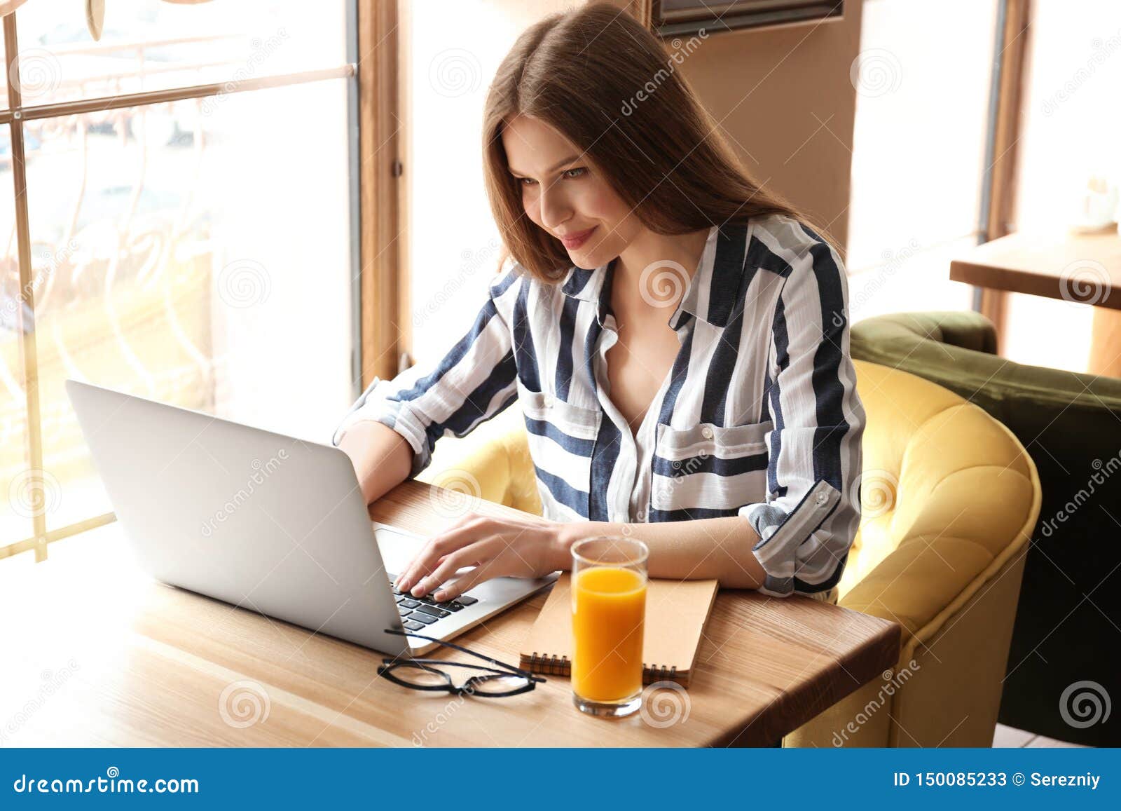 Young Freelancer with Laptop Working in Cafe Stock Image - Image of ...