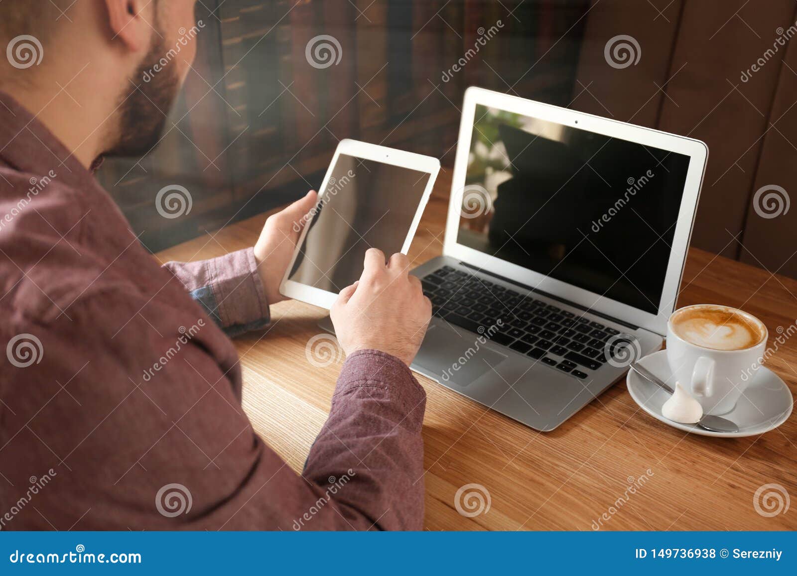 Young Freelancer with Tablet PC and Laptop Working in Cafe Stock Photo ...