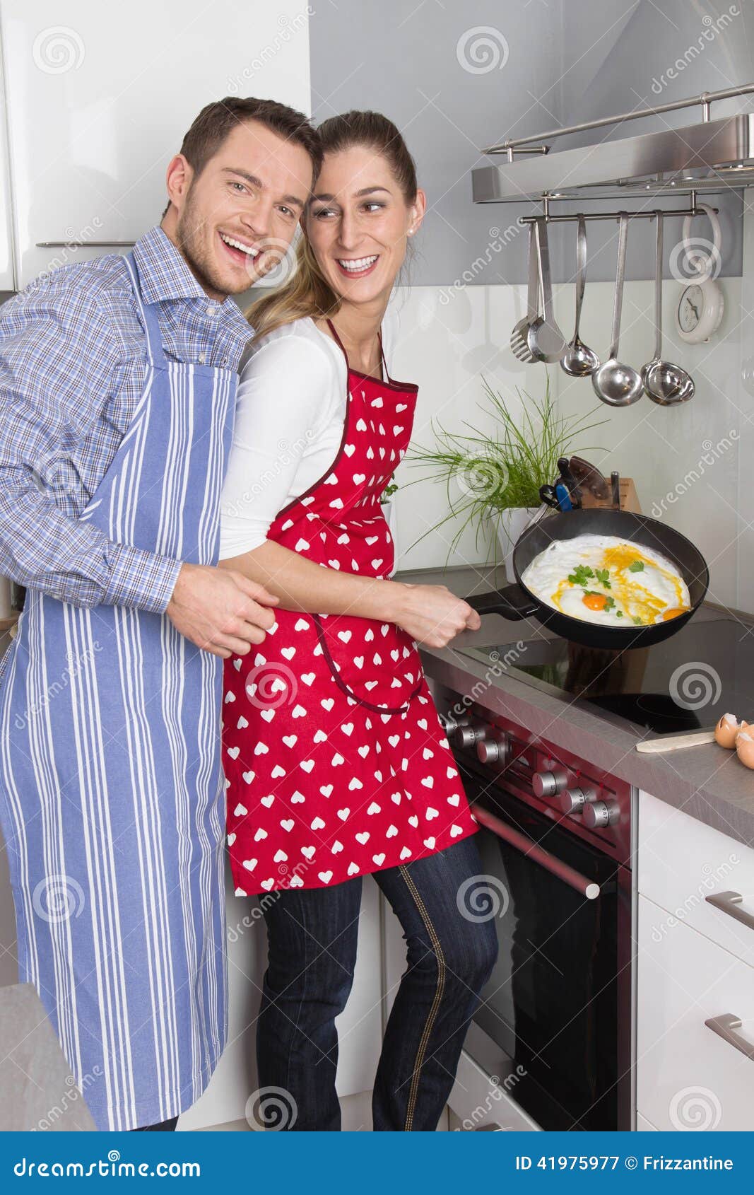 Young Fresh Married Couple in the Kitchen Cooking Together Fried Stock ...