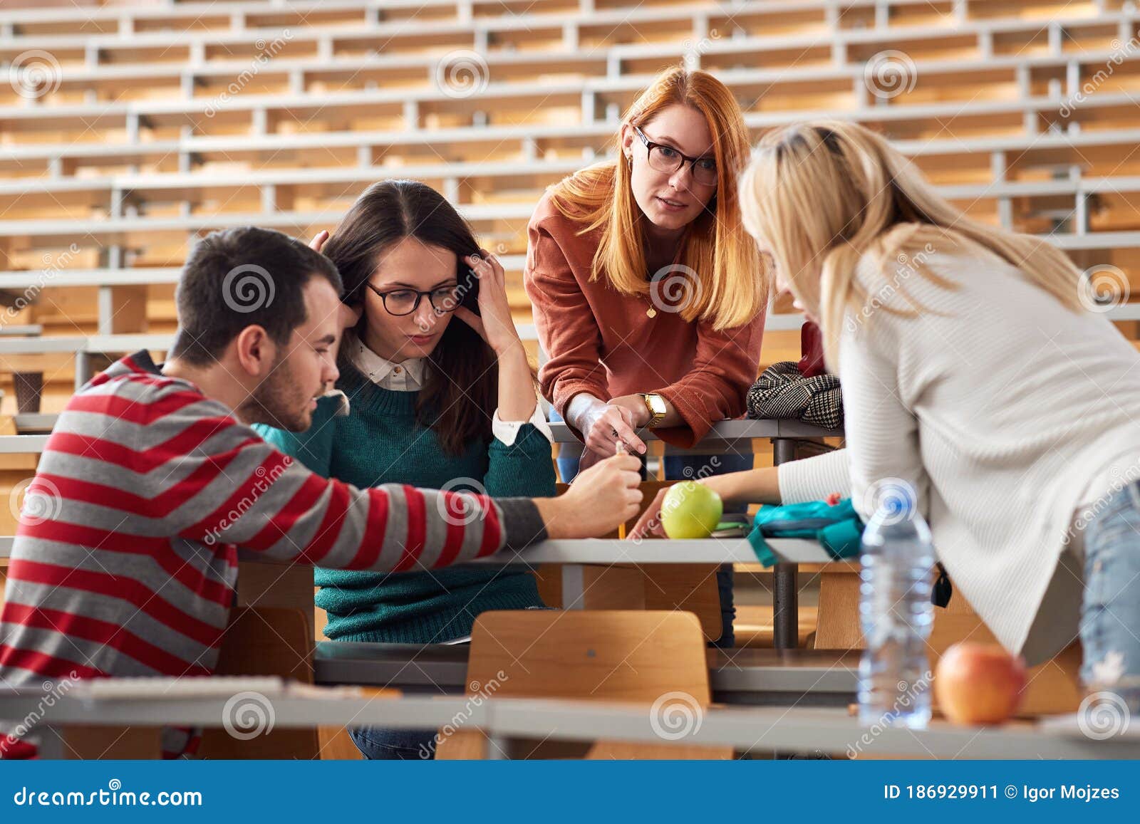 Young Freshmen Students Branstorming and Comparing Notes Stock Image ...