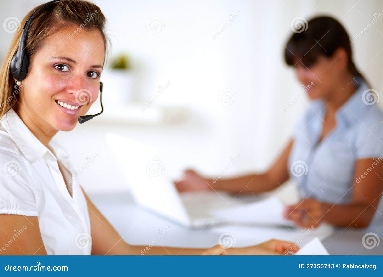 Young Friendly Receptionist Wearing Headphone Stock Image - Image of ...