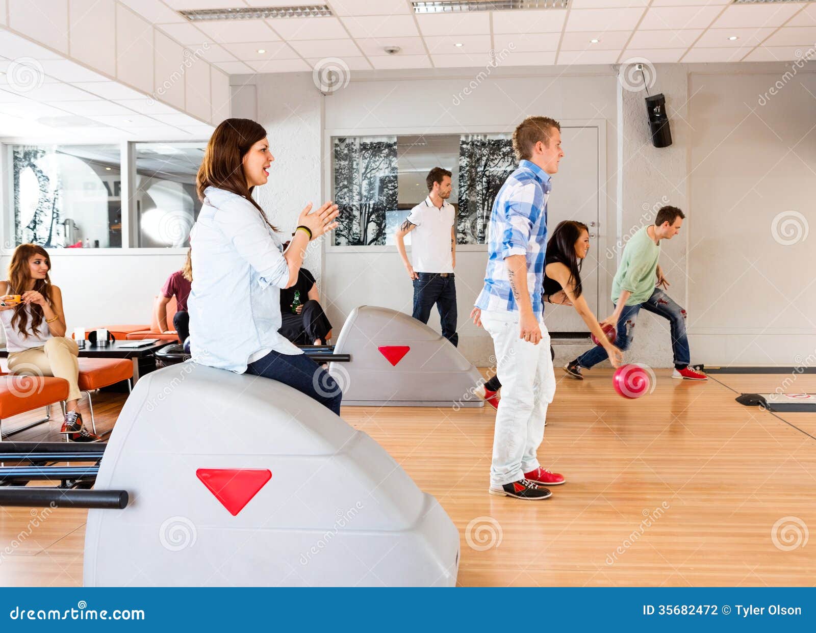 Young Friends Bowling in Club Stock Photo - Image of activity ...