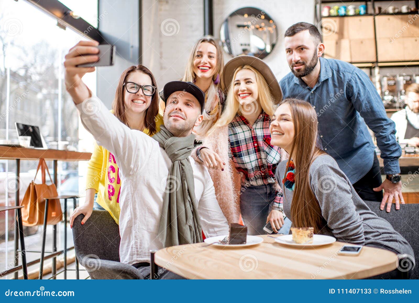Friends in the cafe stock image. Image of phone, diverse - 111407133