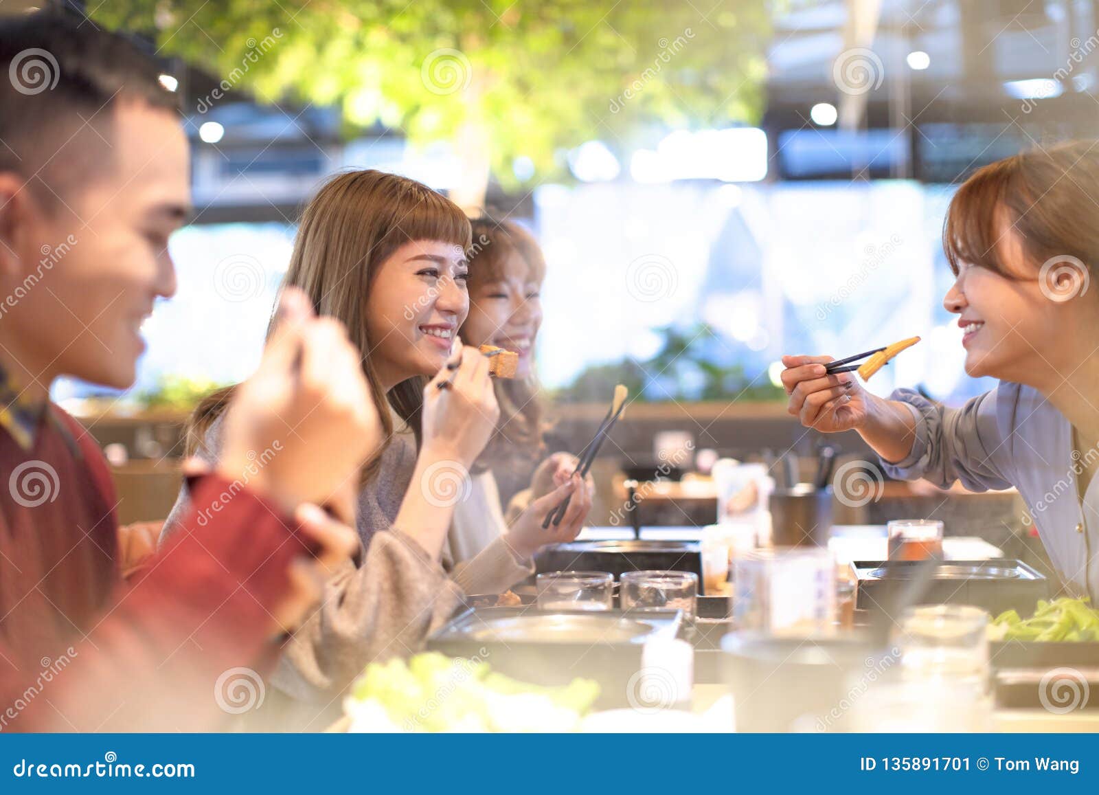 Friends Eating Hot Pot in the Restaurant Stock Image - Image of ...
