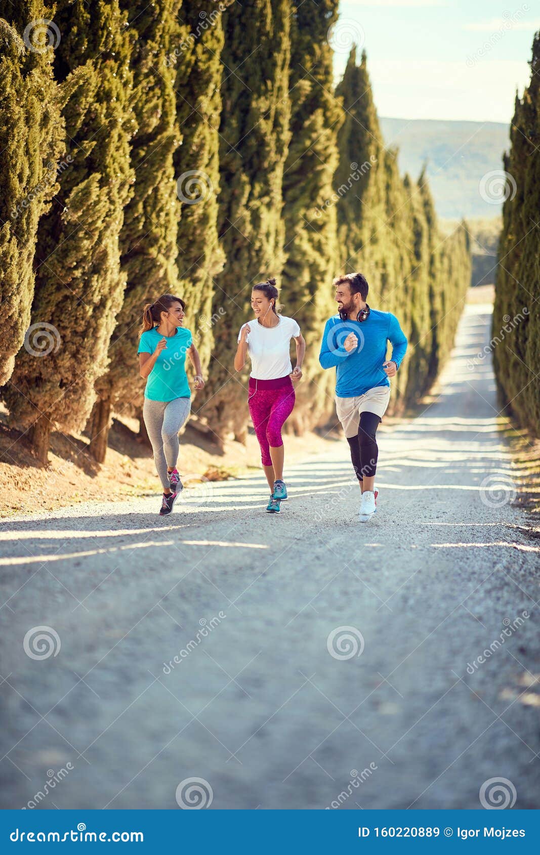 Young Friends Enjoying at Running Together Outdoors Stock Image - Image ...