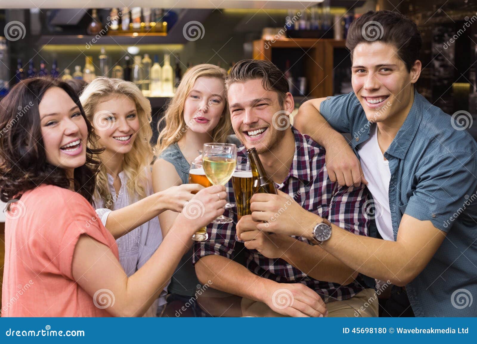 Young Friends Having a Drink Together Stock Photo - Image of people ...