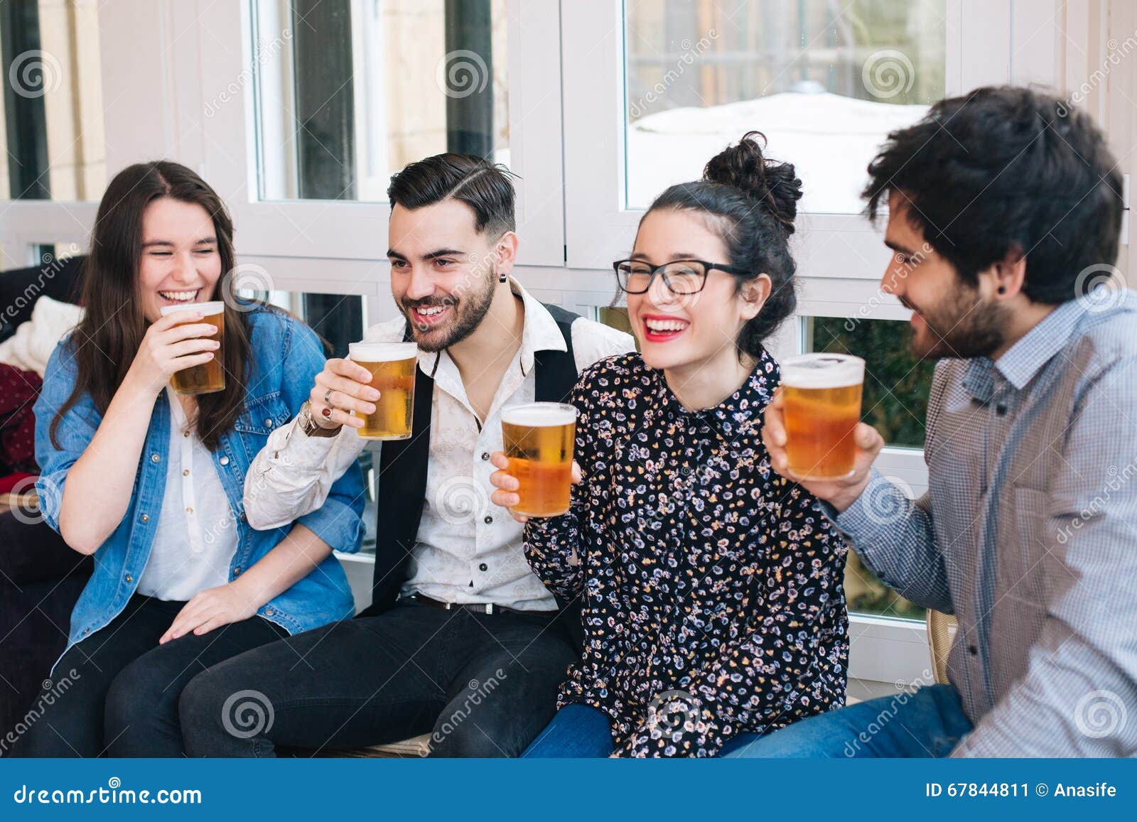 Young Friends Having Fun in a Bar Stock Image - Image of cafe, women ...