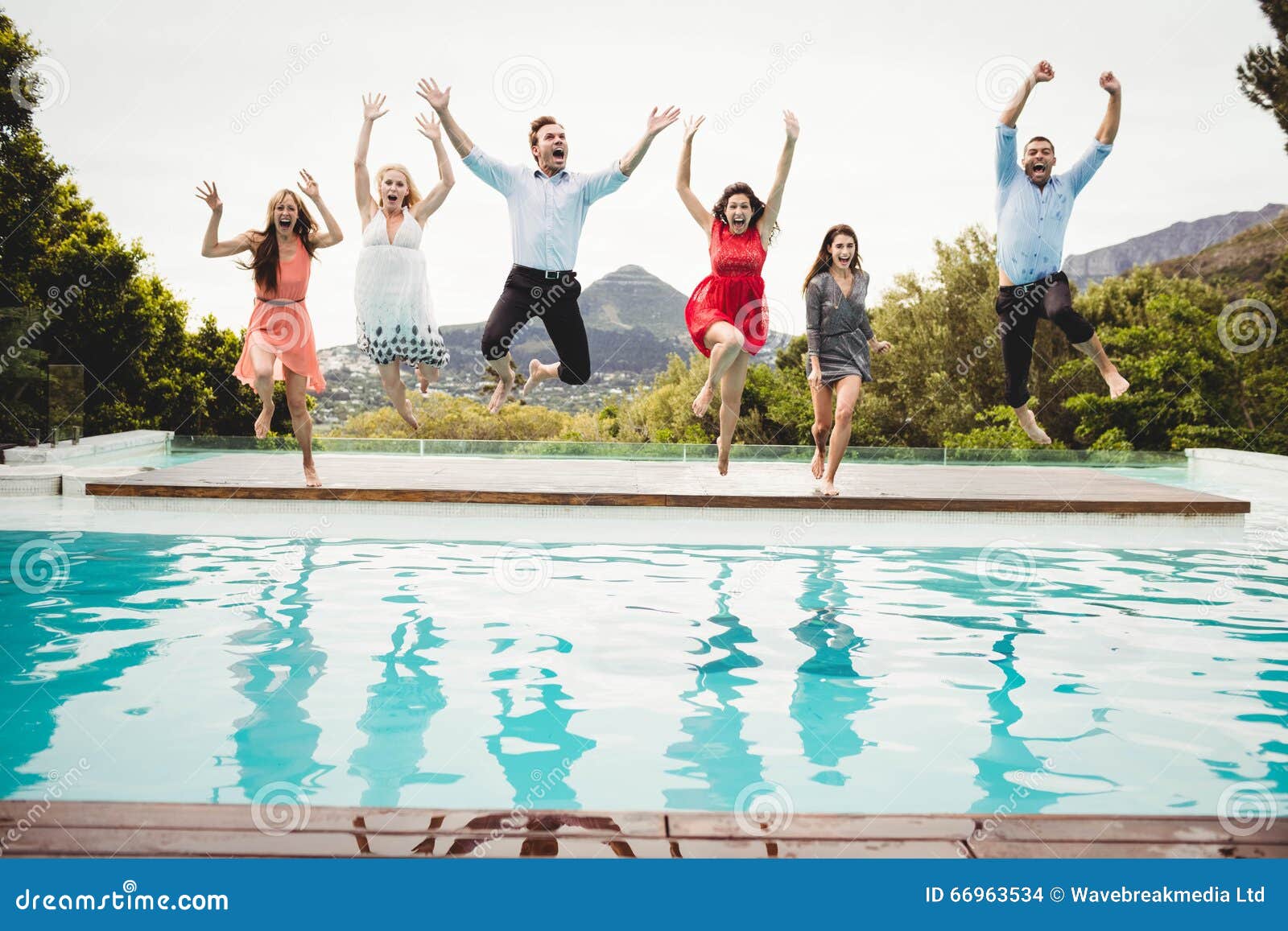 Young Friends Having Fun at Swimming Pool Stock Photo - Image of male ...