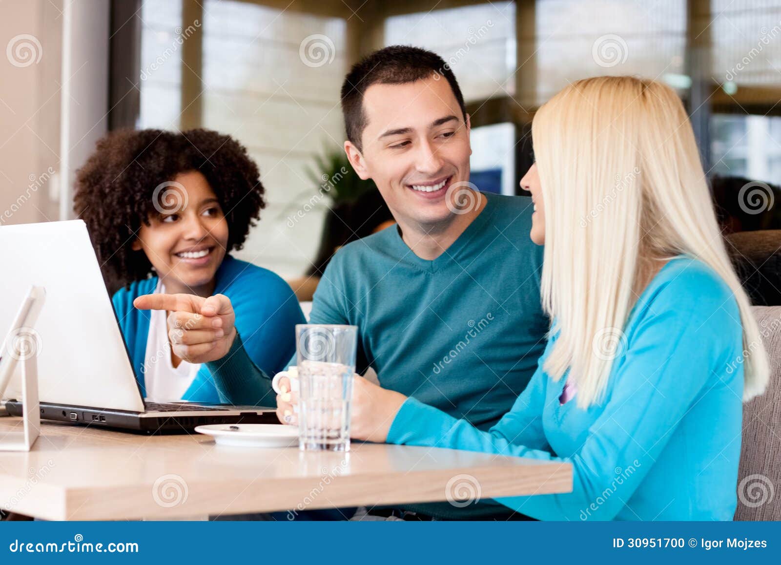 Young friends with laptop stock photo. Image of beautiful - 30951700