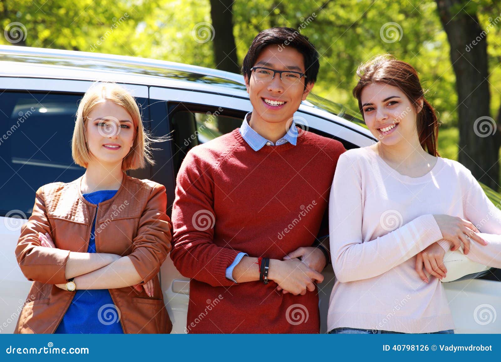 Young Friends Leaning on the Car Stock Photo - Image of lifestyles ...