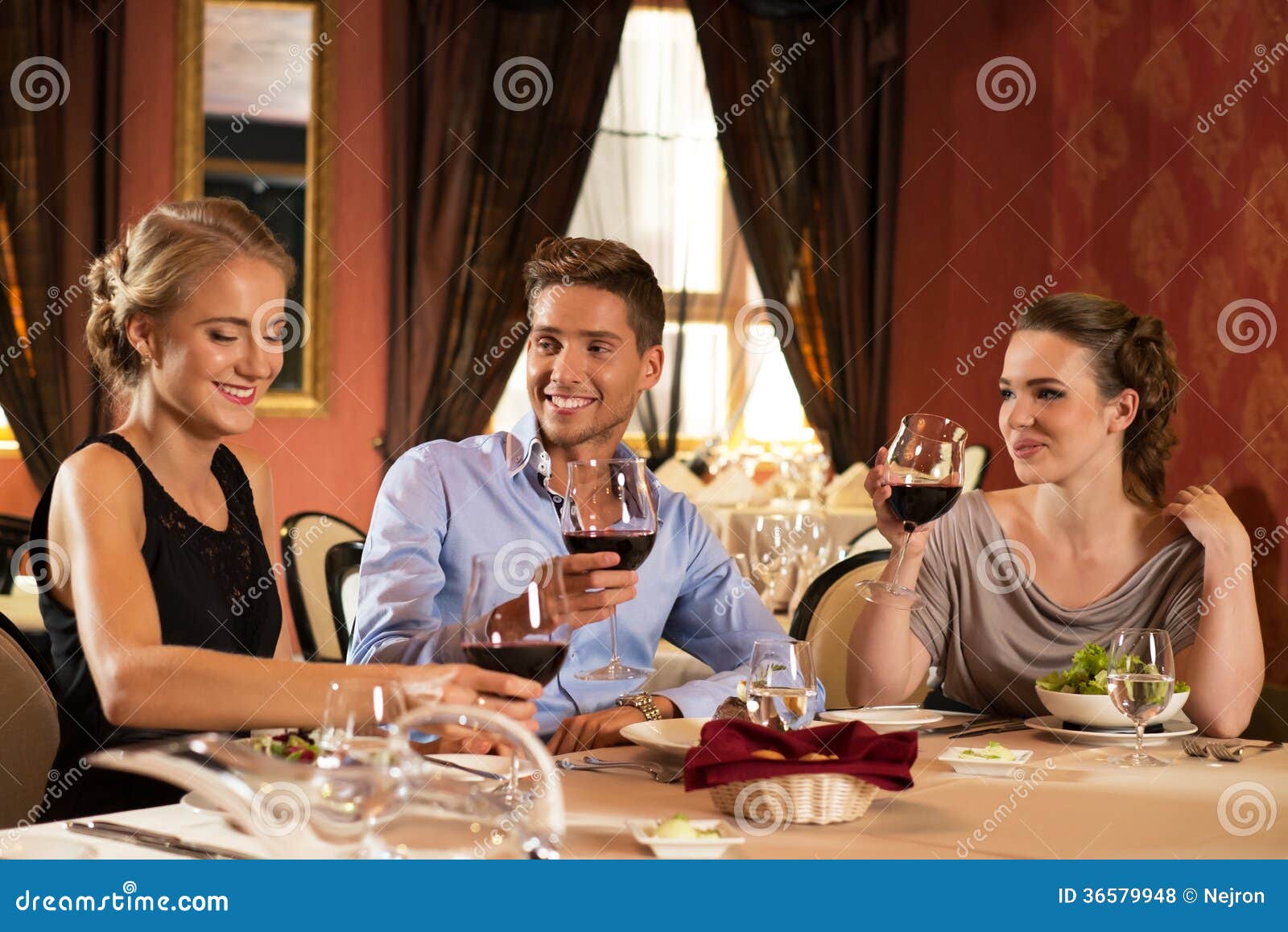 Young Friends in Restaurant Stock Photo - Image of glass, alcohol: 36579948
