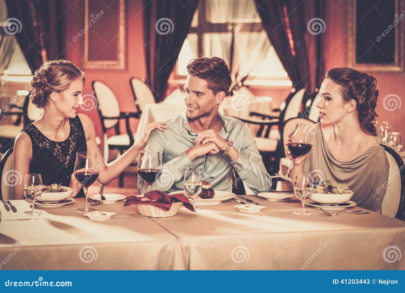Young Friends in a Restaurant Stock Image - Image of elegant, girl ...