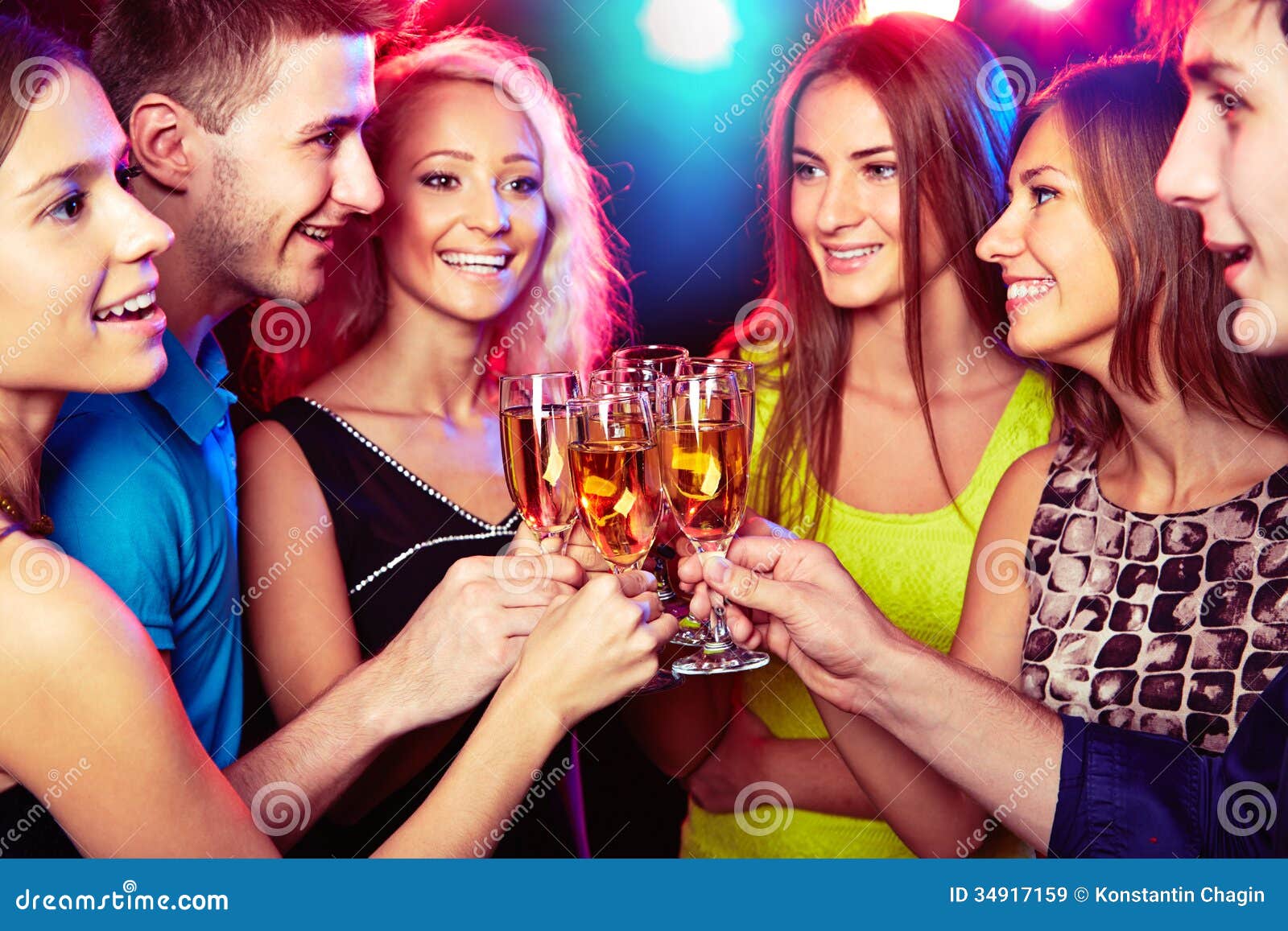 Young Friends Touching the Glasses with Each Other Stock Image - Image ...