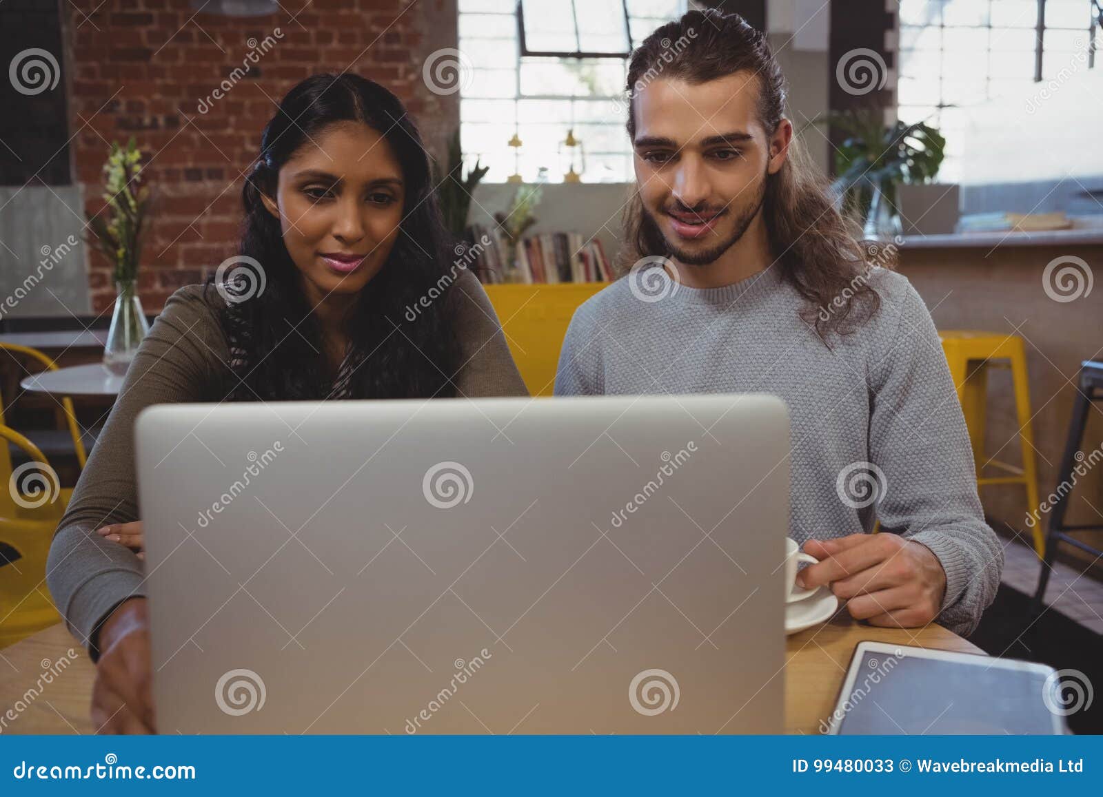 Friends Using Laptop in Cafe Stock Image - Image of communication, hair ...