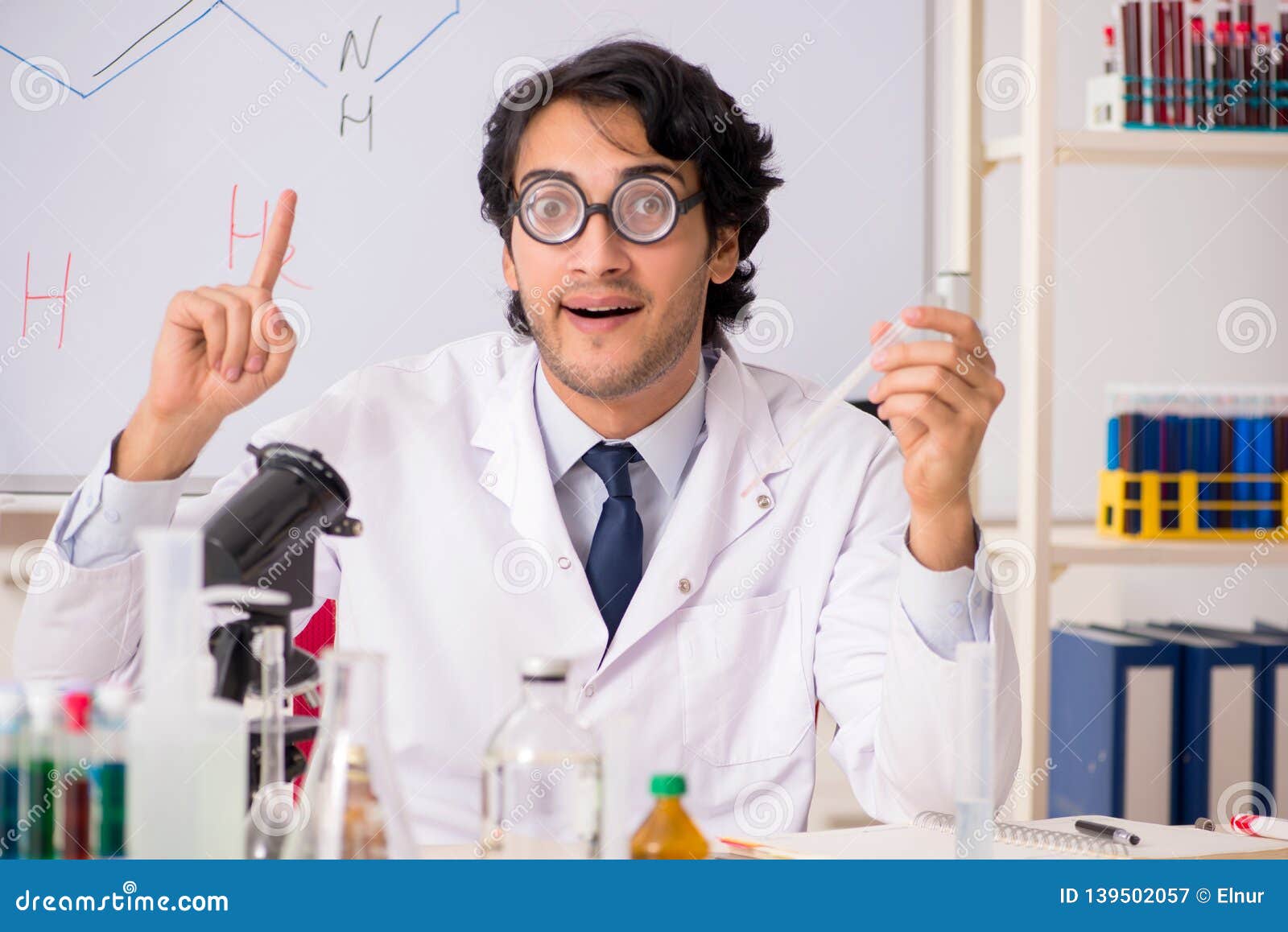 The Young Funny Chemist in Front of White Board Stock Image - Image of ...