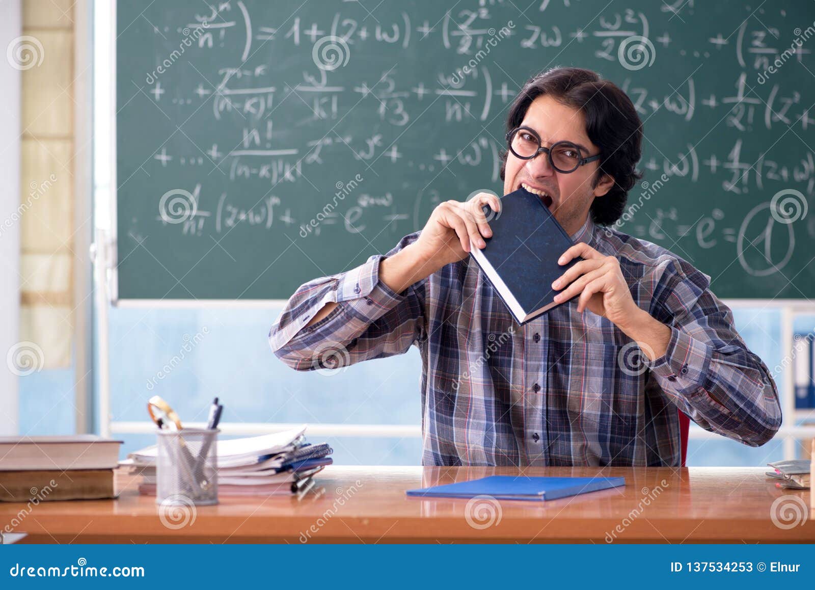 The Young Funny Math Teacher in Front of Chalkboard Stock Image - Image ...